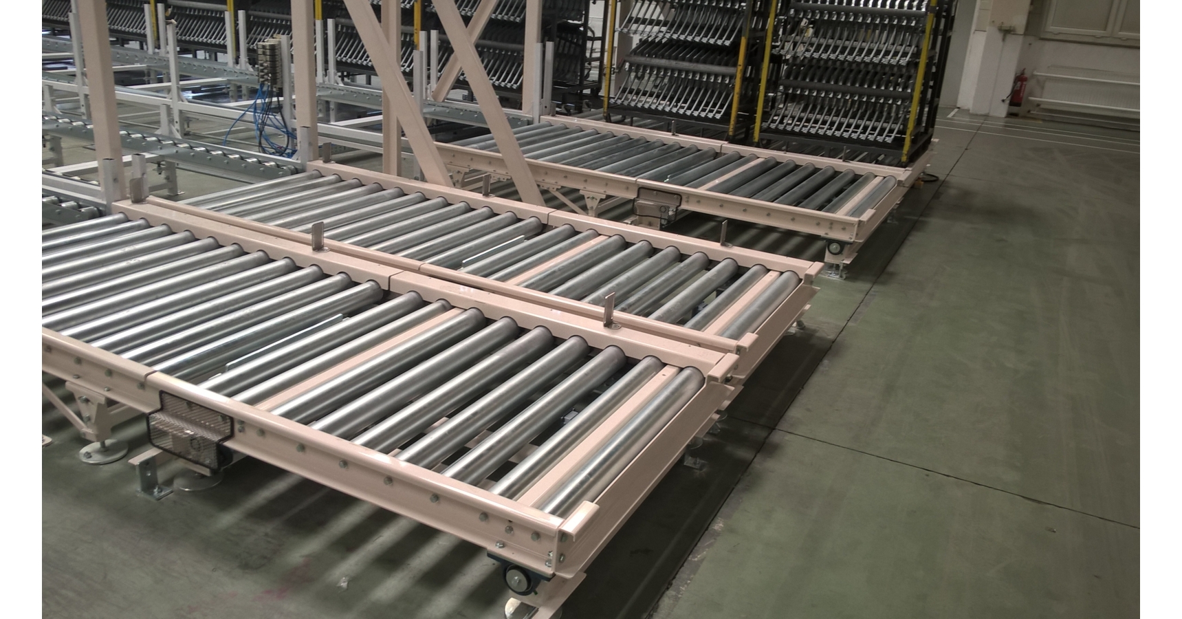 Production of driven roller tracks in straight and curved designs